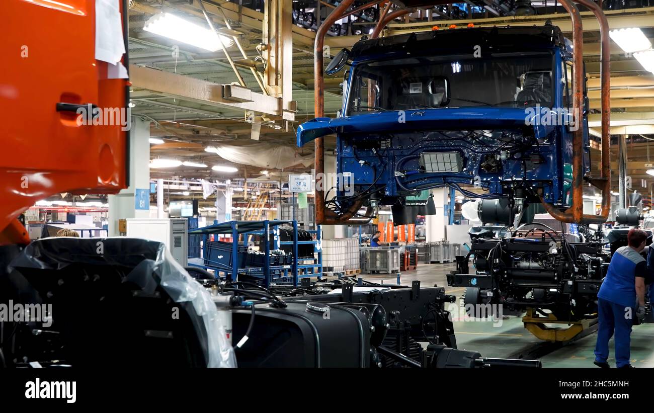 Automobile assembly line production at the Kamaz truck factory. Time ...