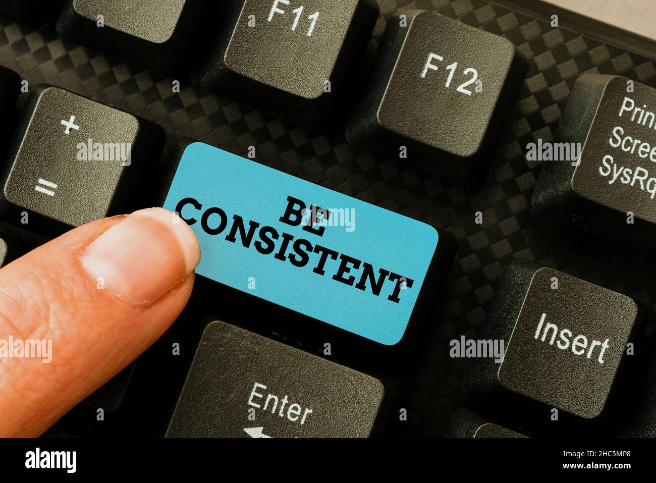 Sign displaying Be Consistent. Concept meaning Uniform Persistent Firm ...