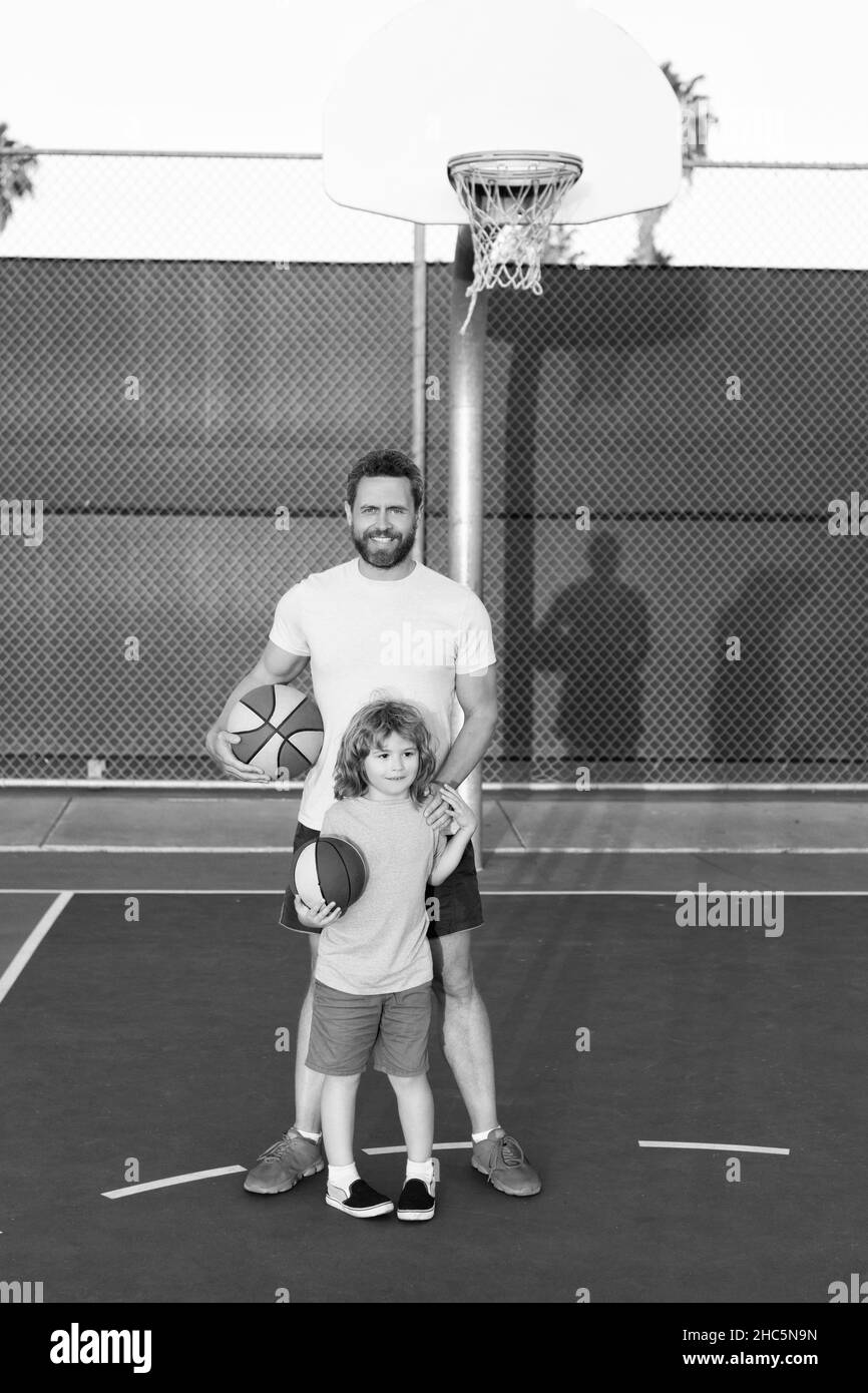 father and son play basketball. happy fathers day. happy family. dad ...