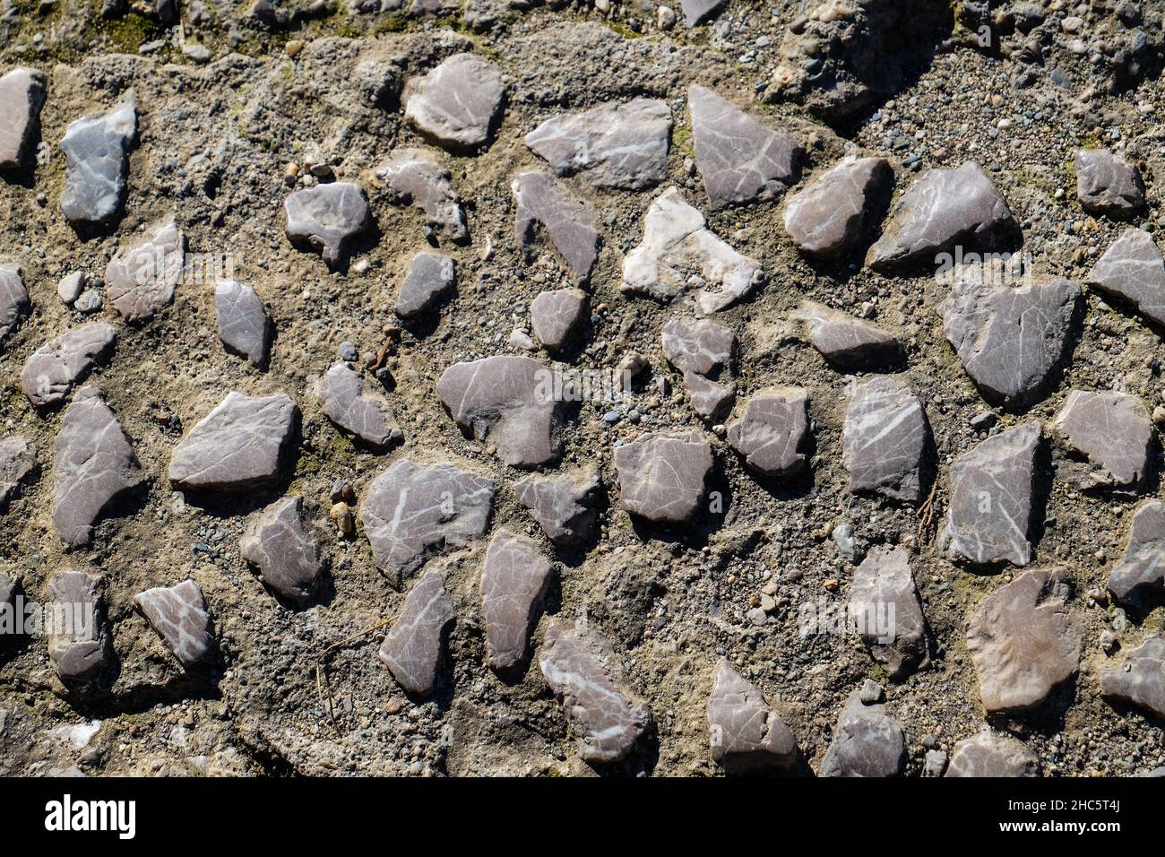 Stones on the road hi-res stock photography and images - Alamy