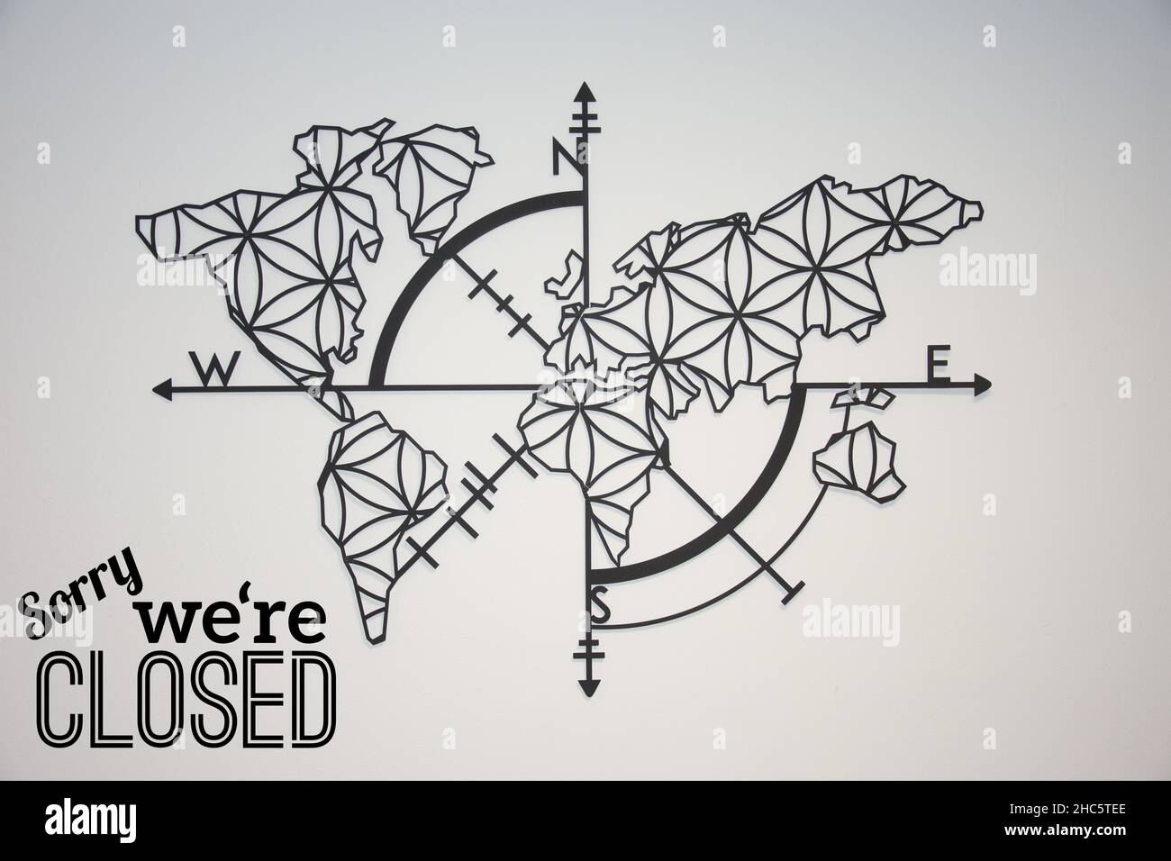 An illustration of the world map with directions saying we're closed ...