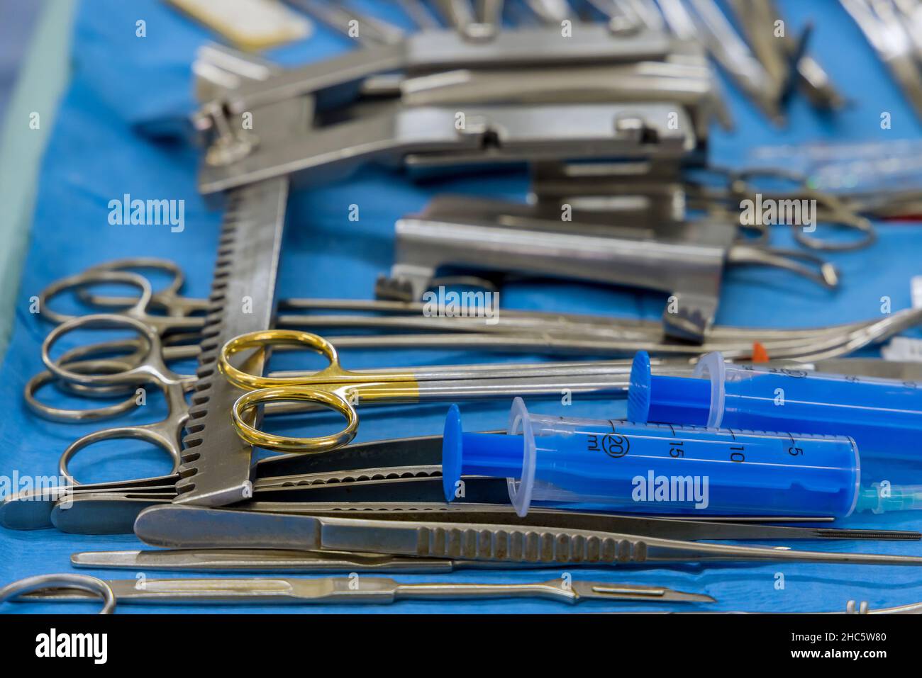 Set of different surgical instruments in the operating room in a ...