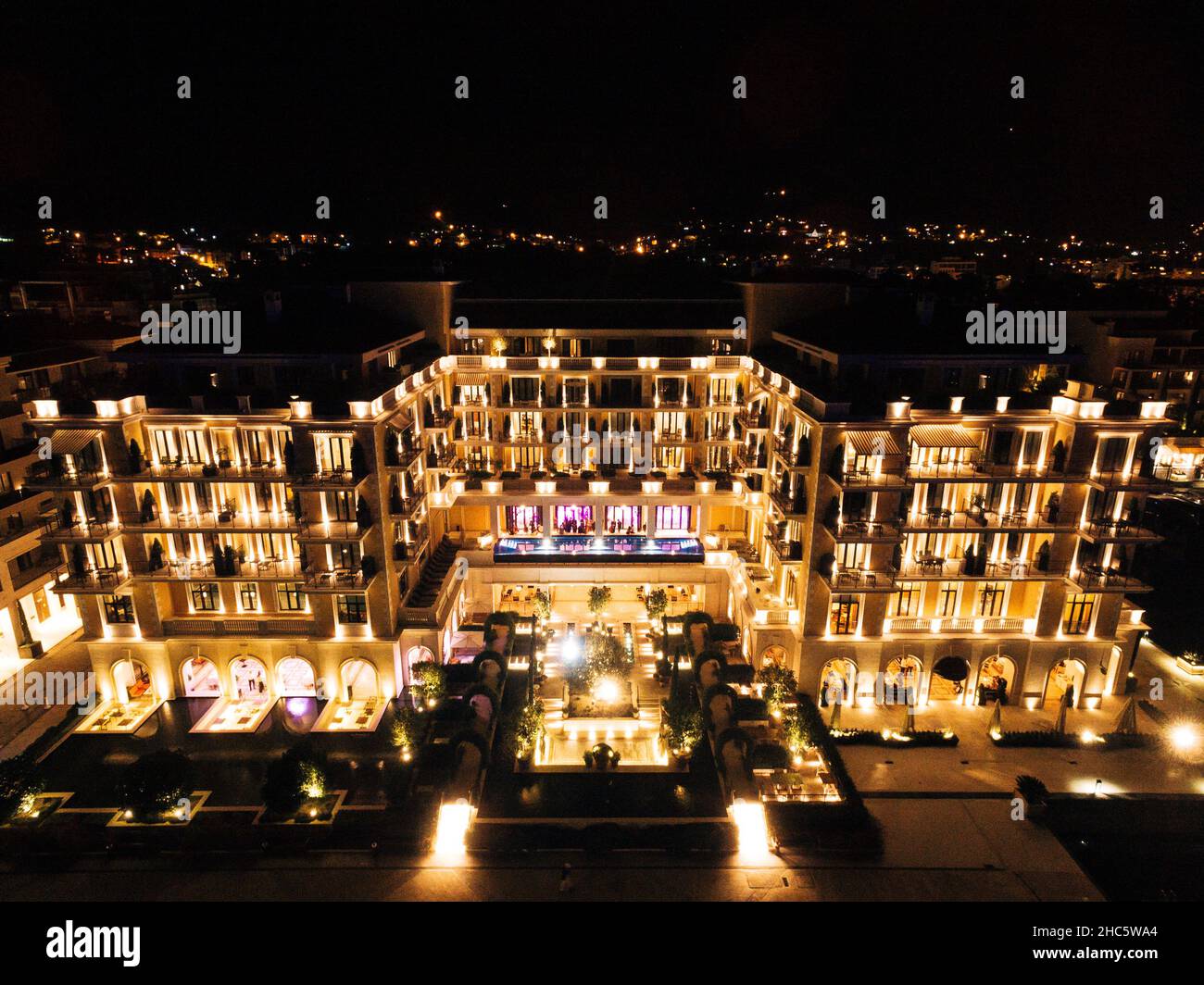 Regent Hotel shines with night lights in Porto. Montenegro Stock Photo - Alamy