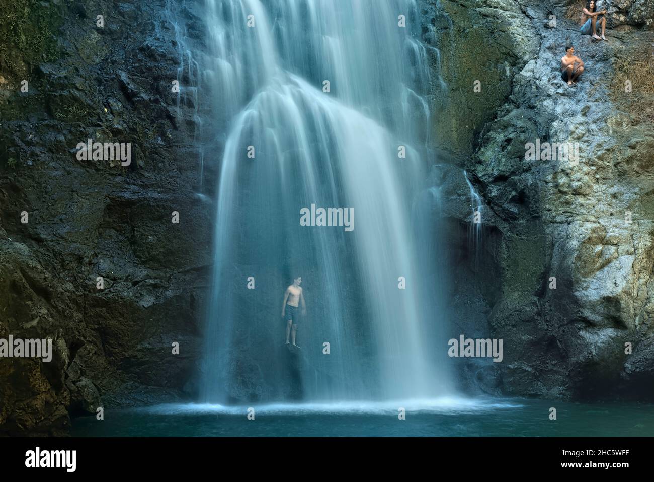 Enjoying the cascades at Montezuma Waterfall, Puntarenas, Costa Rica ...
