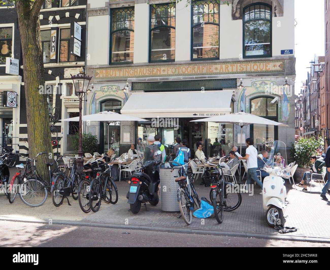 People enjoying their time in the cafe in Amsterdam, Netherlands Stock ...