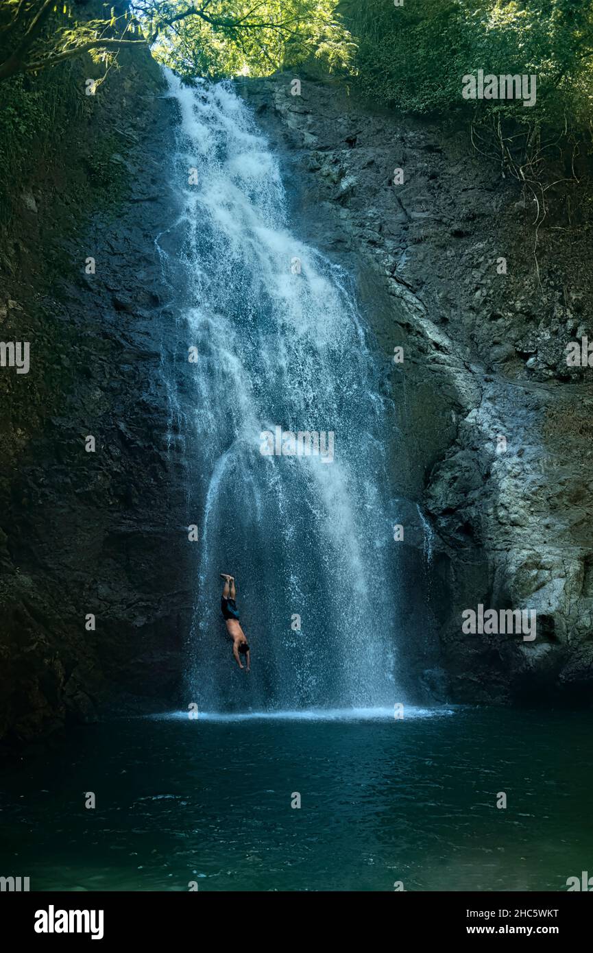 Enjoying the cascades at Montezuma Waterfall, Puntarenas, Costa Rica ...