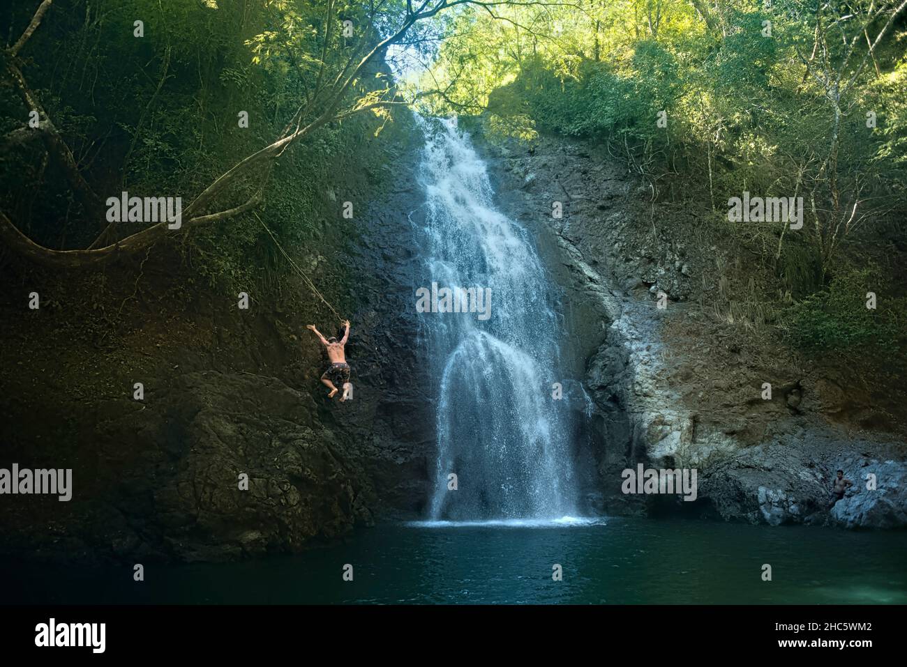 Enjoying the cascades at Montezuma Waterfall, Puntarenas, Costa Rica ...