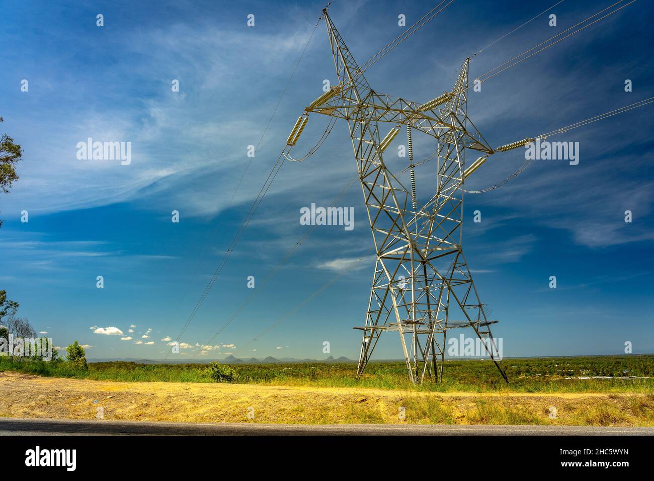 Australian electricity pole with Glass House mountains in the ...