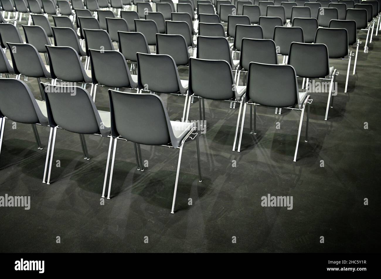 Gray empty audience seats arranged in rows Stock Photo - Alamy