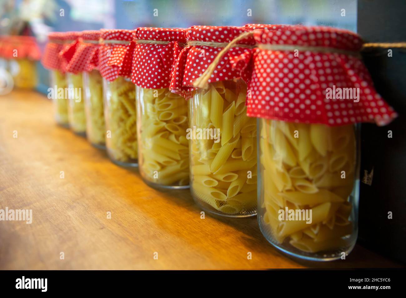 Pasta in jars arranged side by side Stock Photo - Alamy