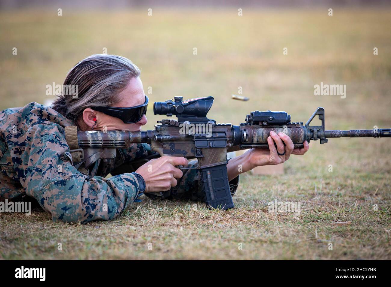 Camp Hansen, Okinawa, Japan. 9th Dec, 2021. A U.S. Marine fires in the ...