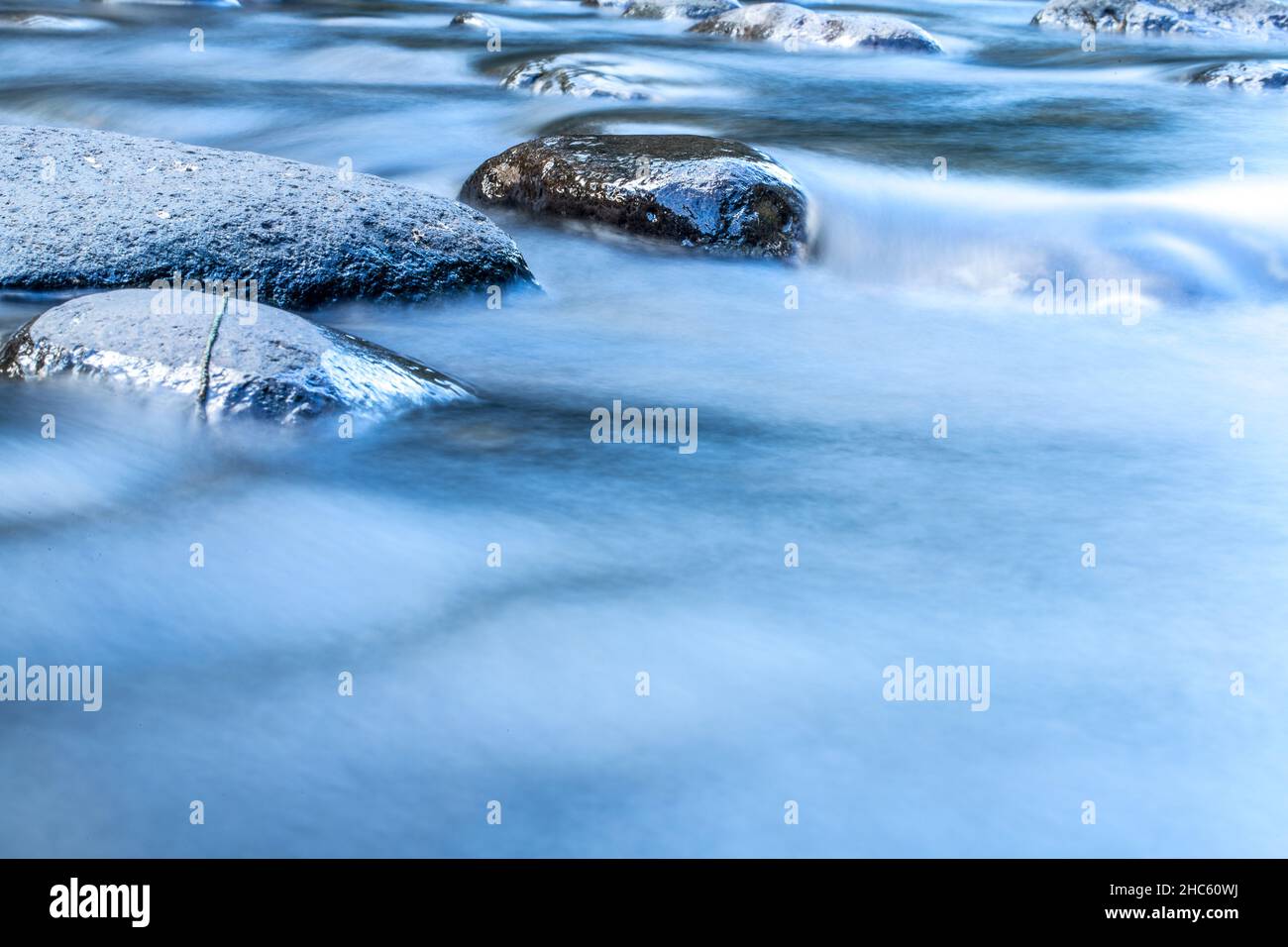 Surface of an iced river Stock Photo - Alamy