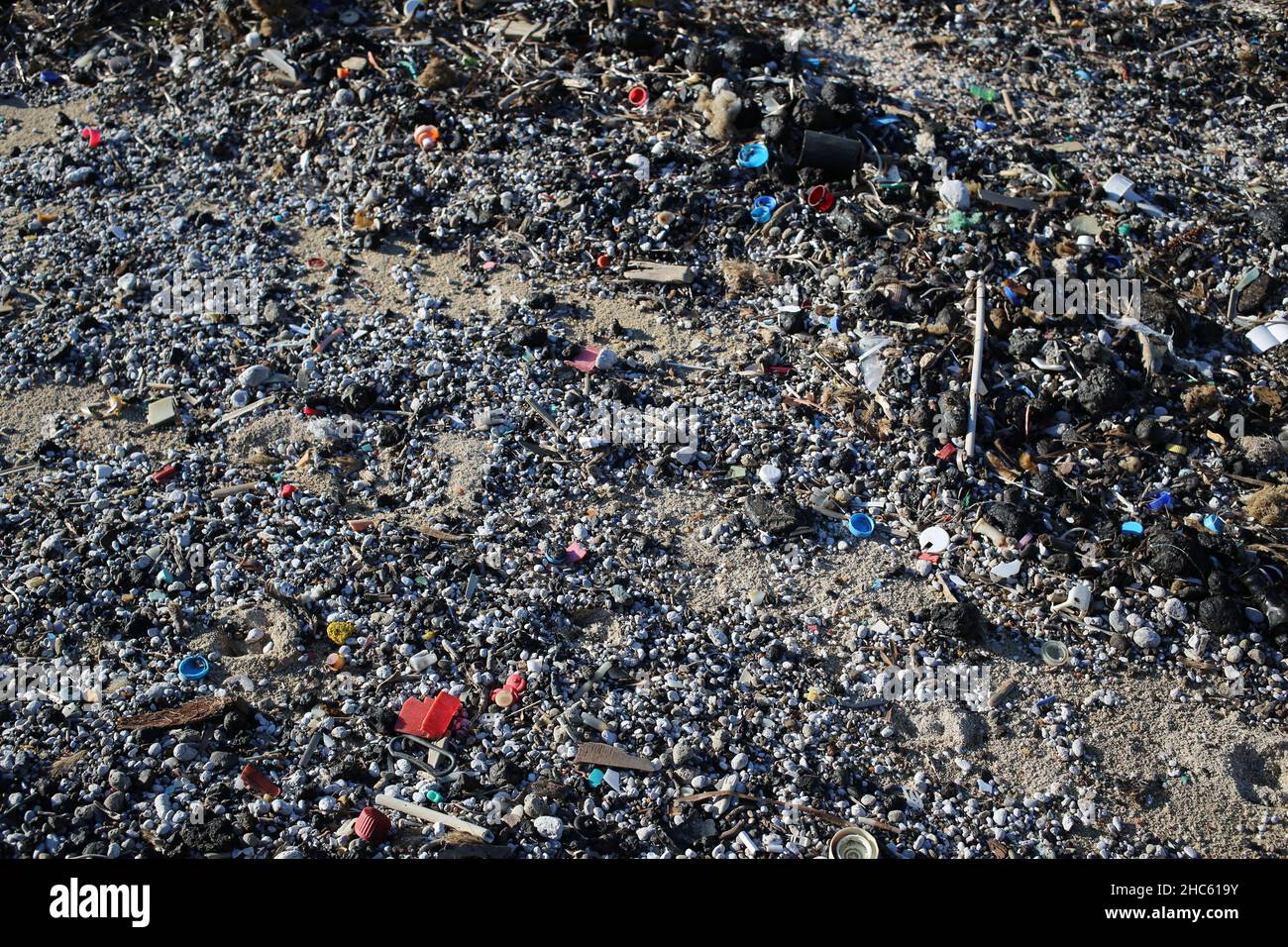 Plastic pollution on the beach in Greece Stock Photo - Alamy