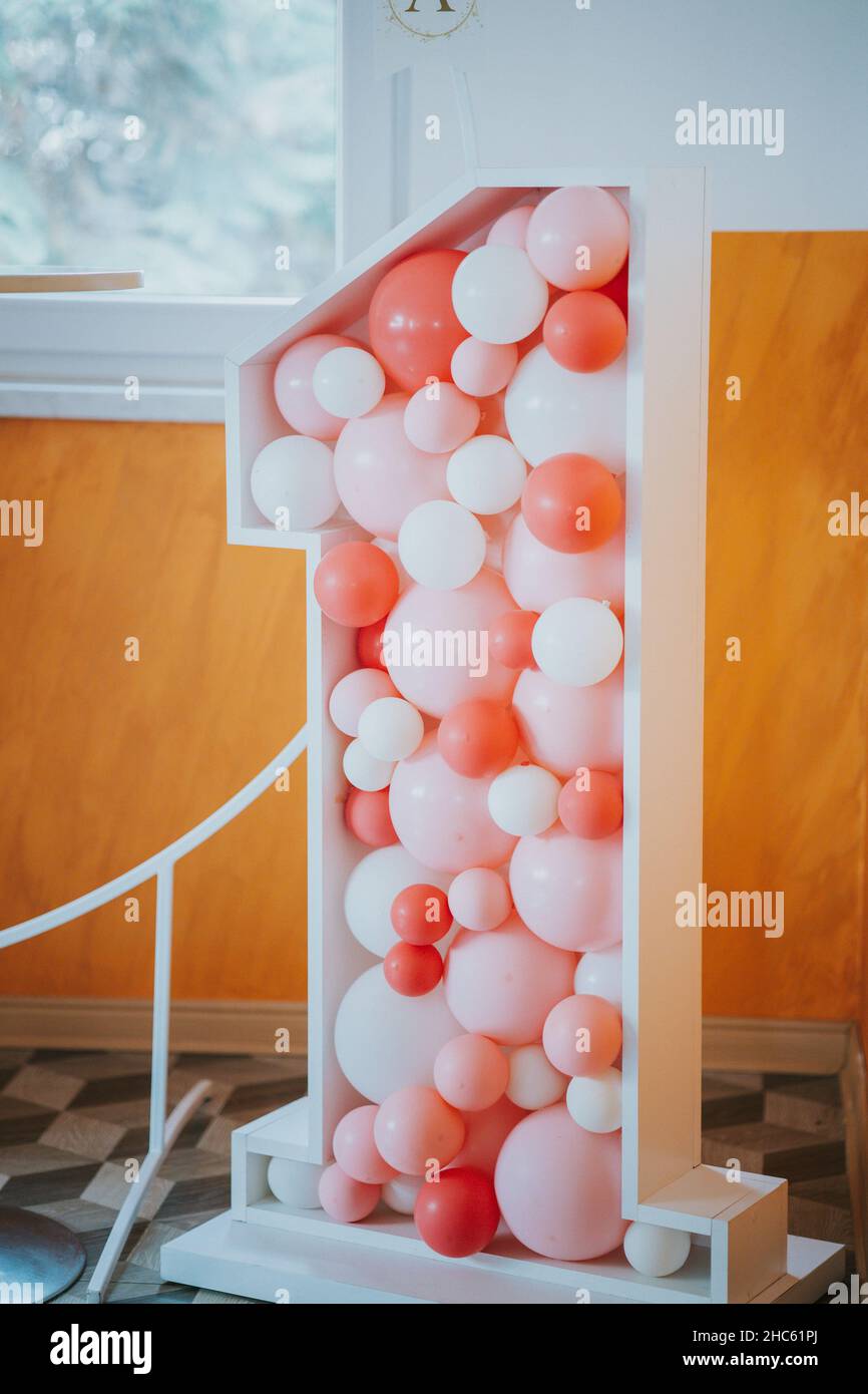 Number 1 birthday stand with balloons Stock Photo - Alamy
