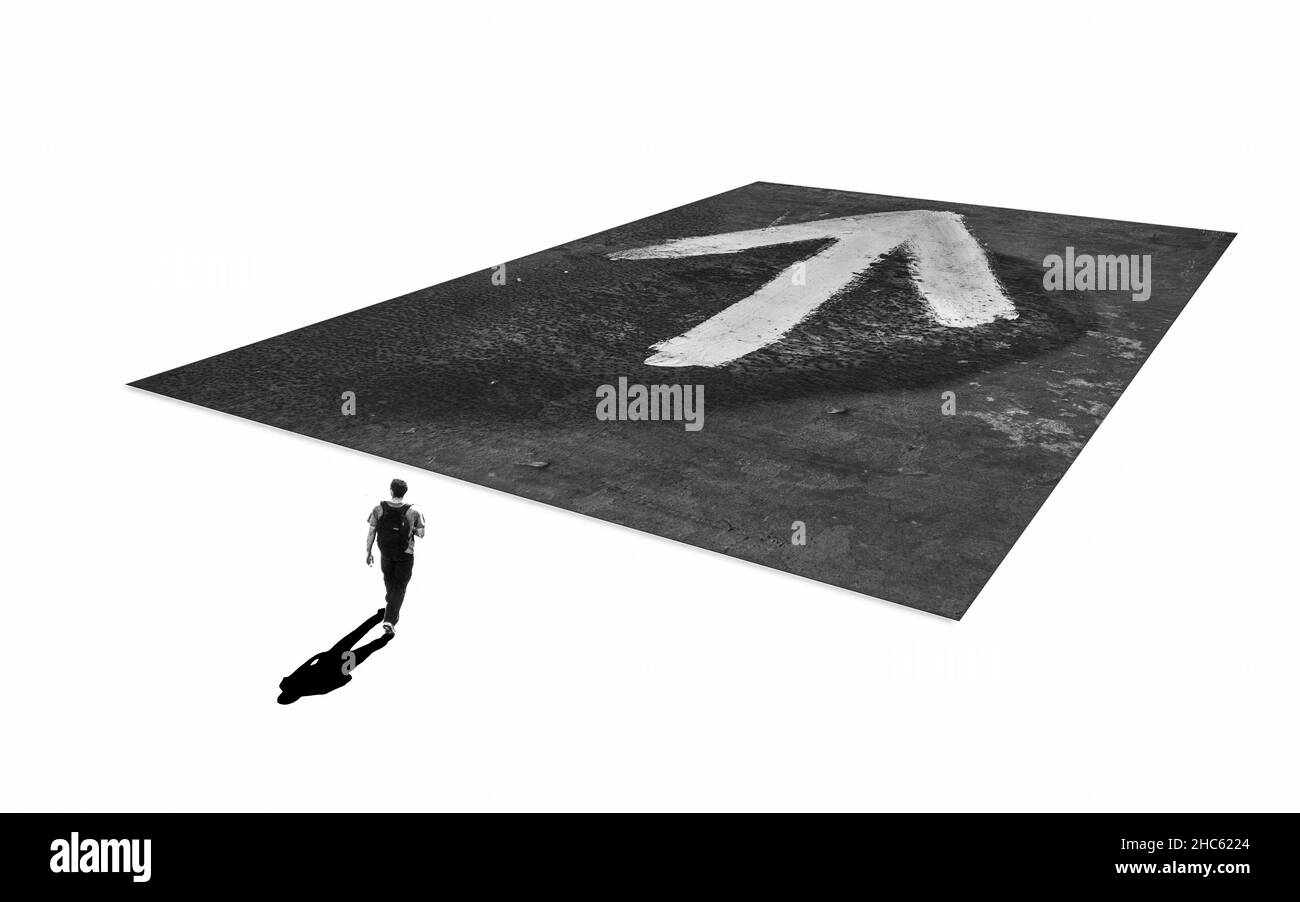 A shadow of a guy following direction of a big arrow on the ground, on ...