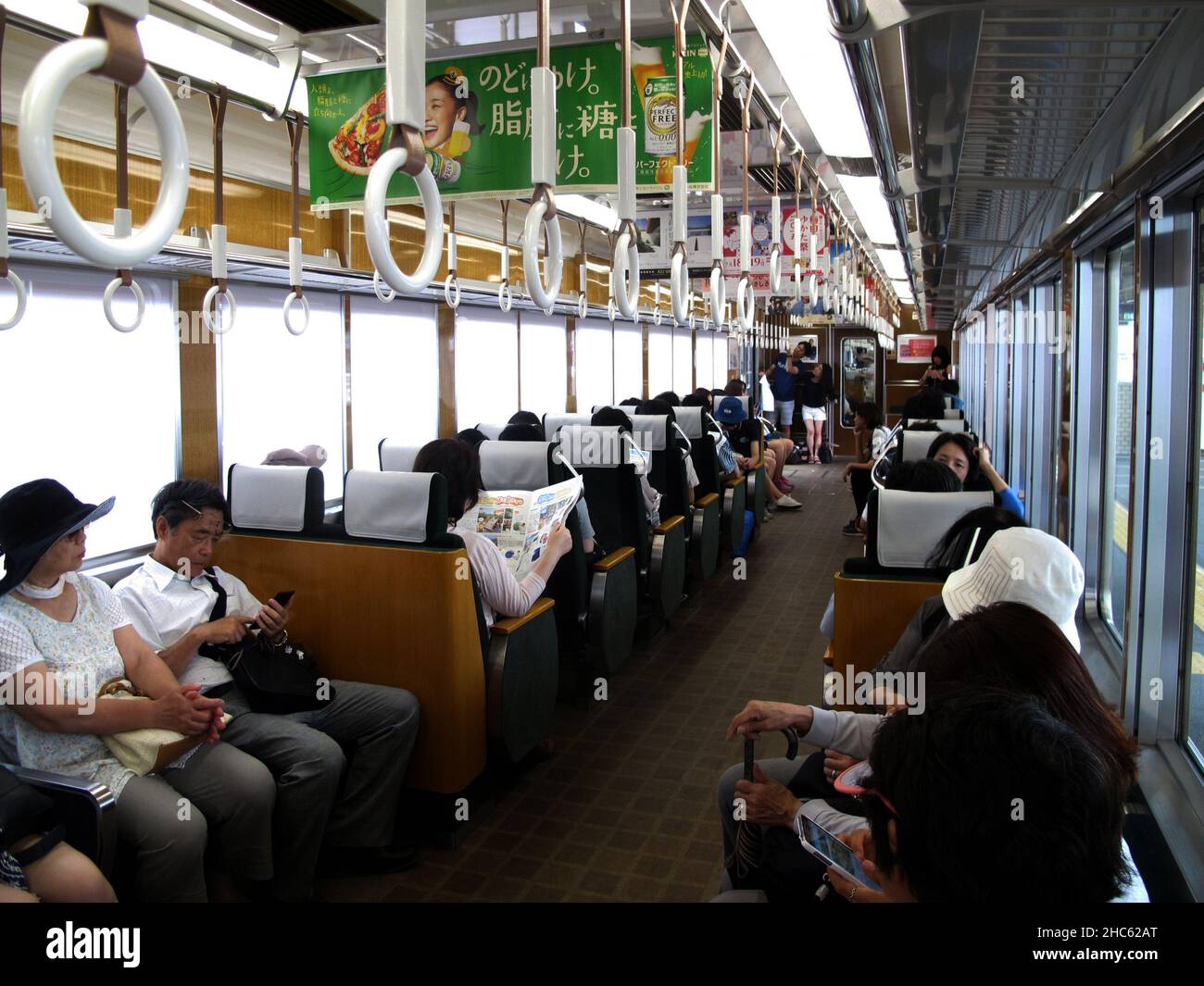 Interior design local train and japanese people and foreign travelers ...
