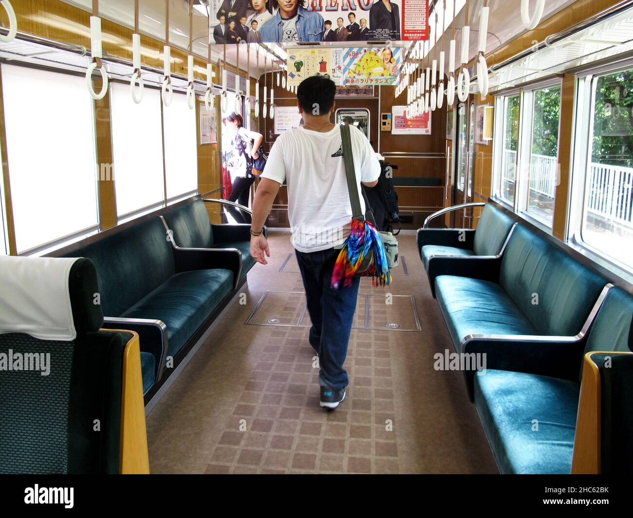 Interior design local train and japanese people and foreign travelers ...