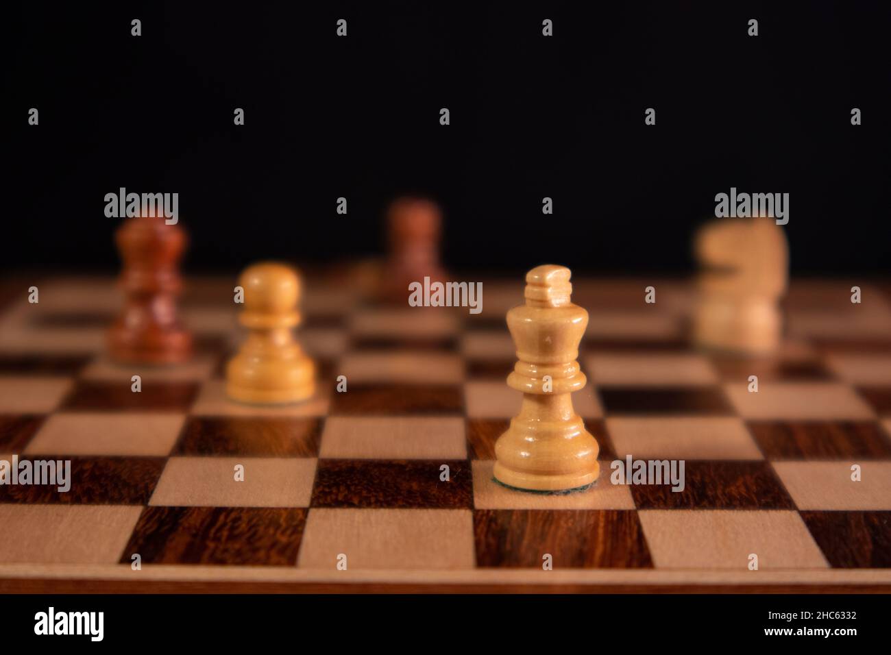 High angle of a chess desk with some figurines on it Stock Photo - Alamy