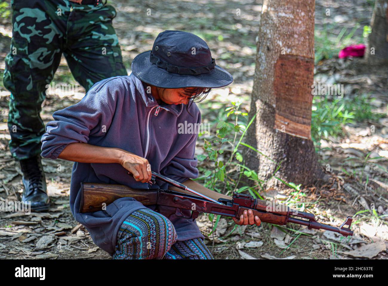 Kayin State, Myanmar. 23rd Nov, 2021. A member of People Deference ...