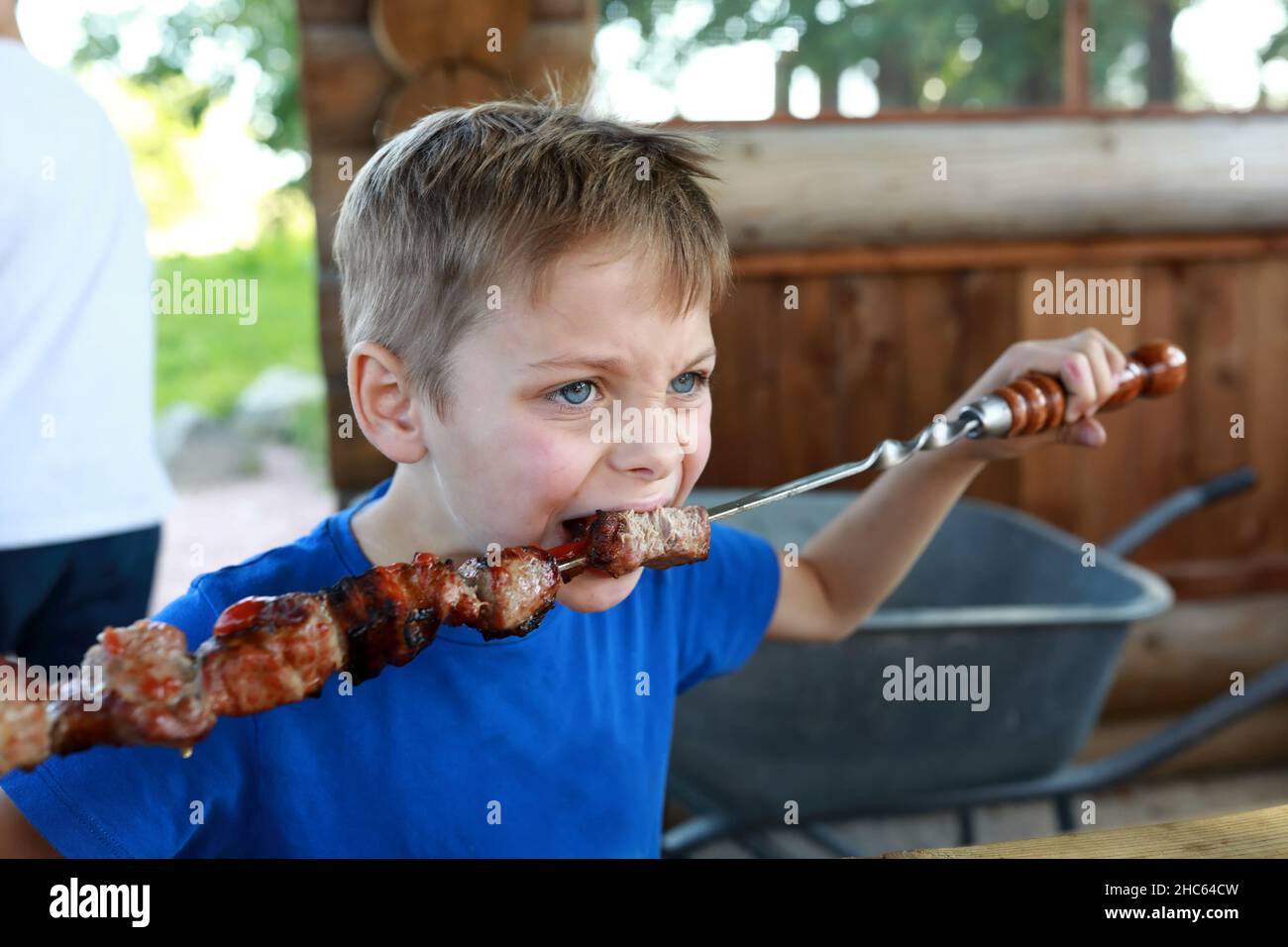 Child eating pork meat hi-res stock photography and images - Alamy