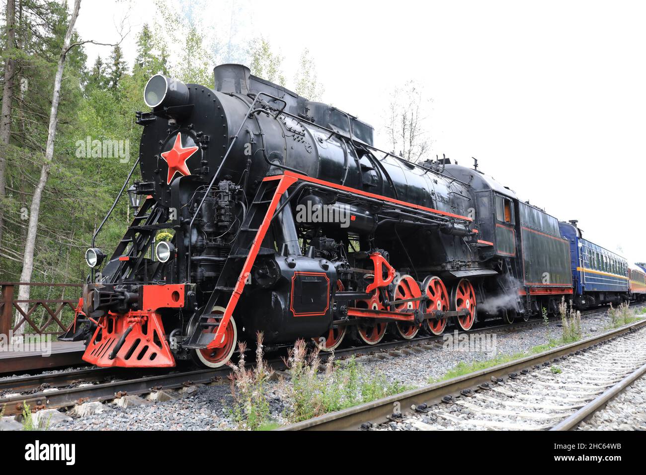 Details of ancient engine locomotive at railway station Stock Photo - Alamy