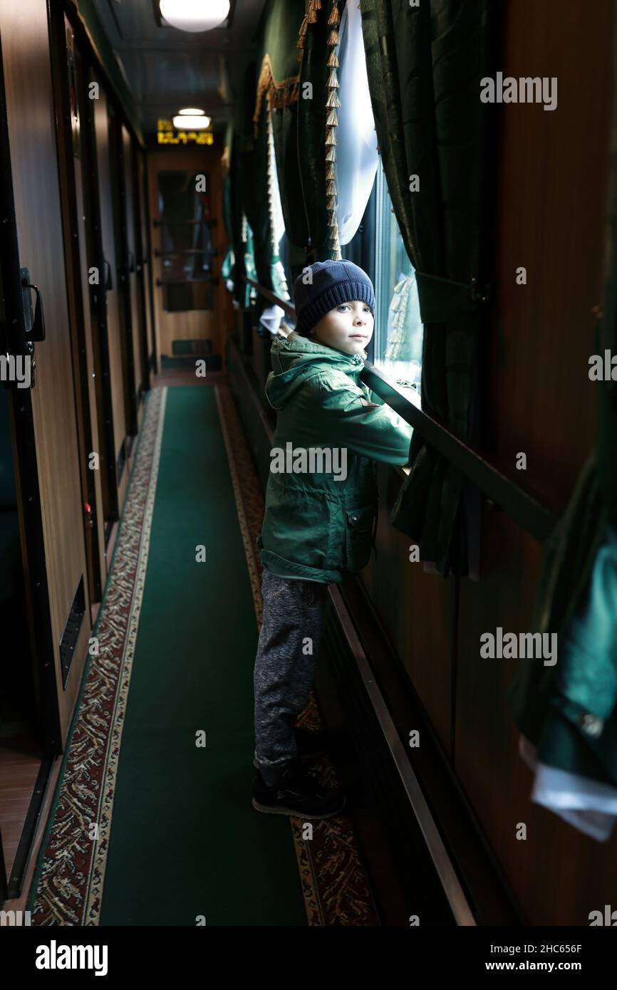 Portrait of child in retro train carriage Stock Photo - Alamy