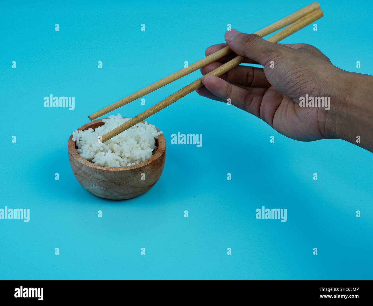 Taking rice with chopstick hi-res stock photography and images - Alamy