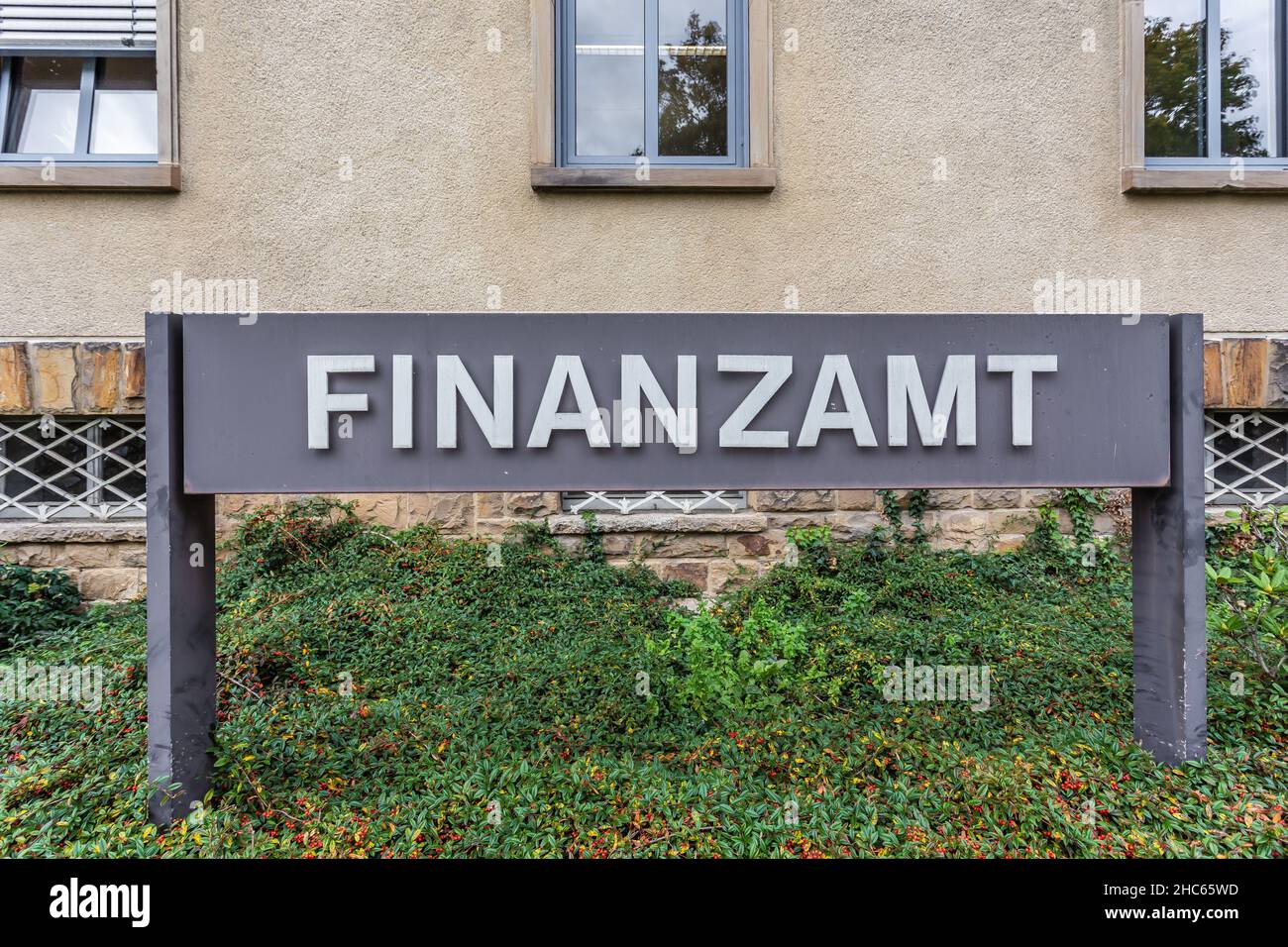 Sign which says FINANZAMT in front of a Tax Office Building in ...