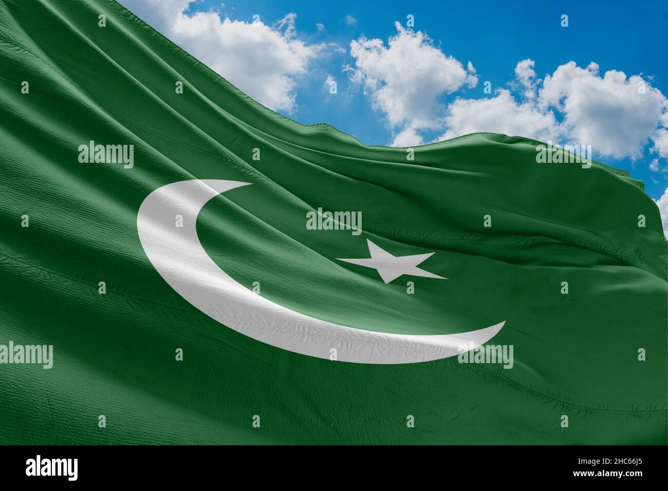 The flag of Pakistan on blue sky Stock Photo - Alamy