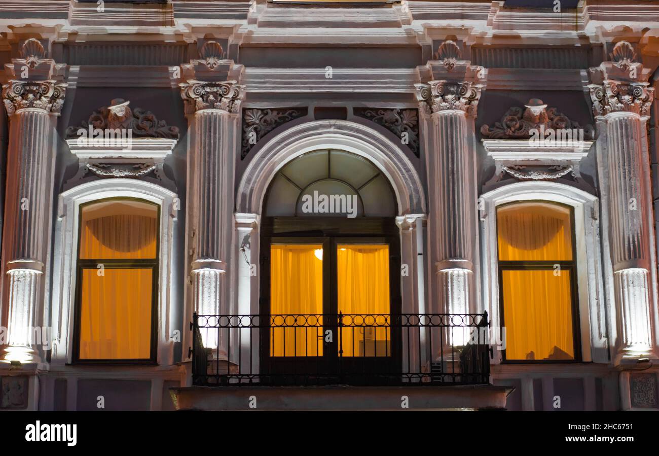 Beautiful facade of the building with columns, arches, patterns and a ...