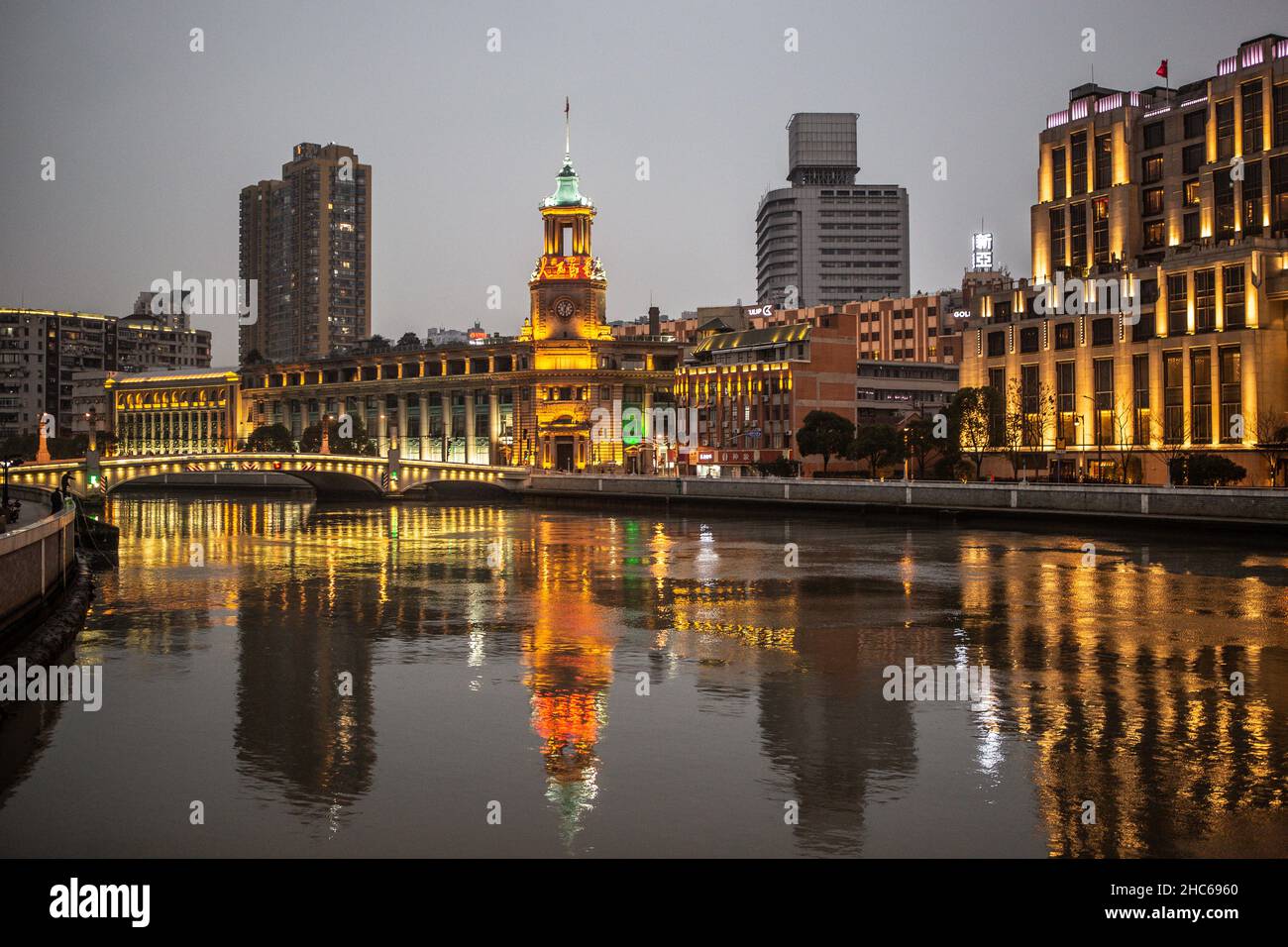 The Shanghai Post Museum is illuminated by golden yellow night lights ...