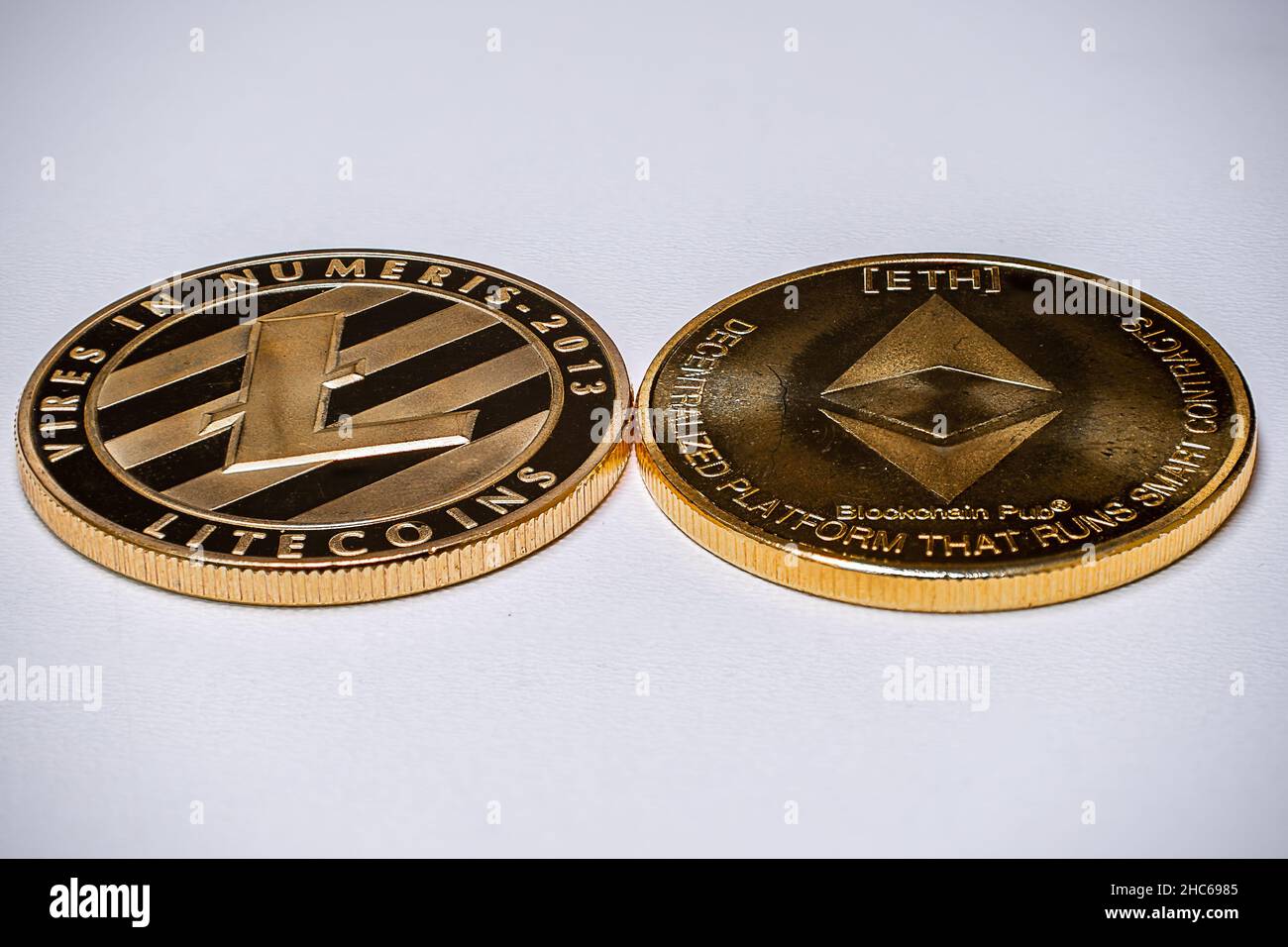 Closeup of Physical representation of Lite coin and ETH ...