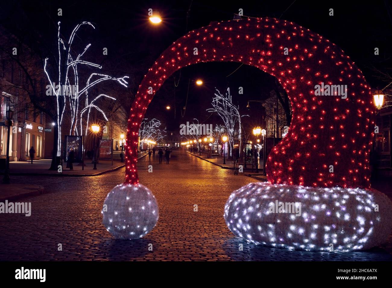 Evening main city street Deribasovskaya with Christmas decorations and ...