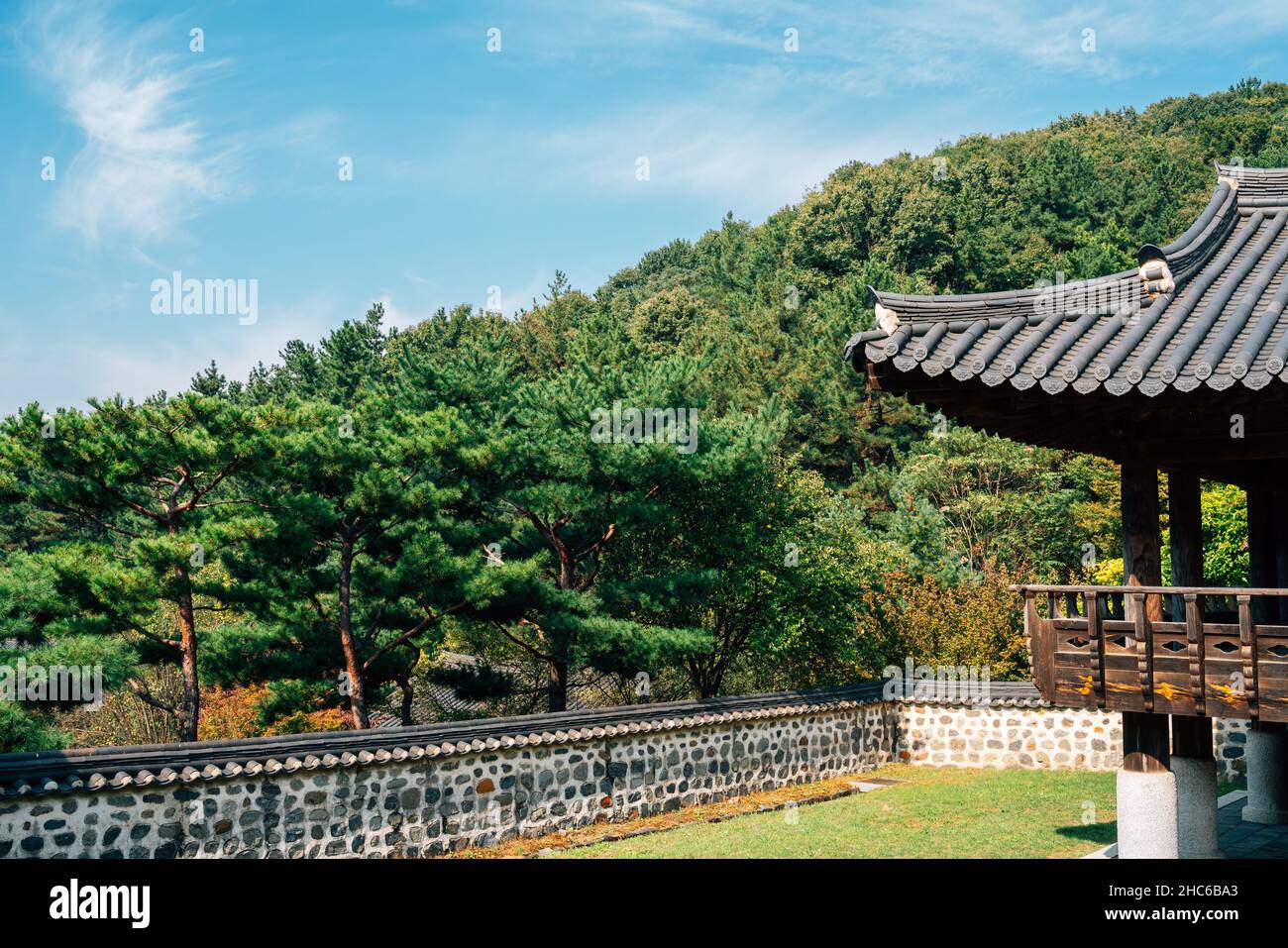 Korean traditional pavilion and green forest at Uam Historic Park in ...