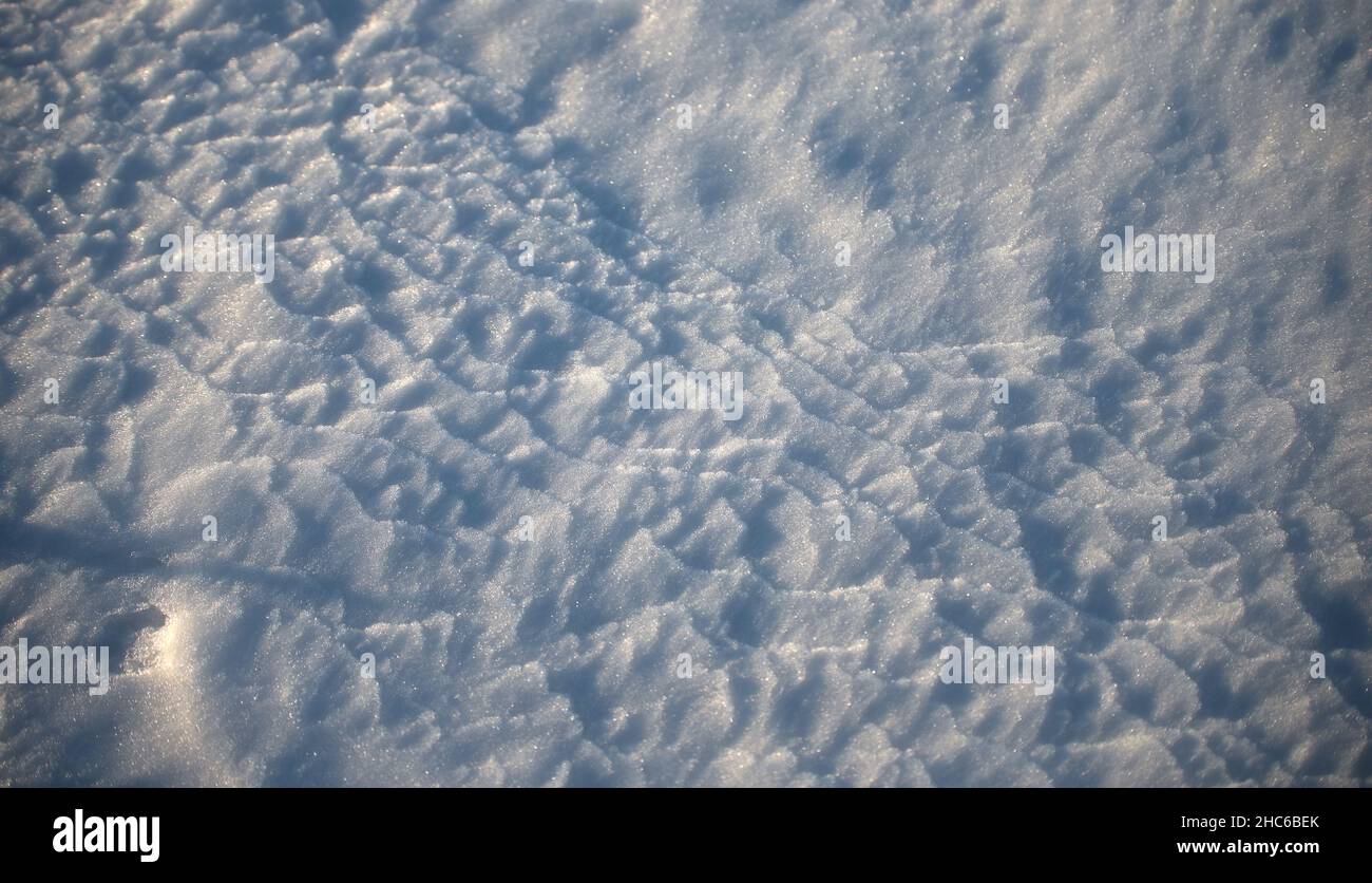 Texture, snow cover, surface, with traces of a blizzard, shallow depth ...