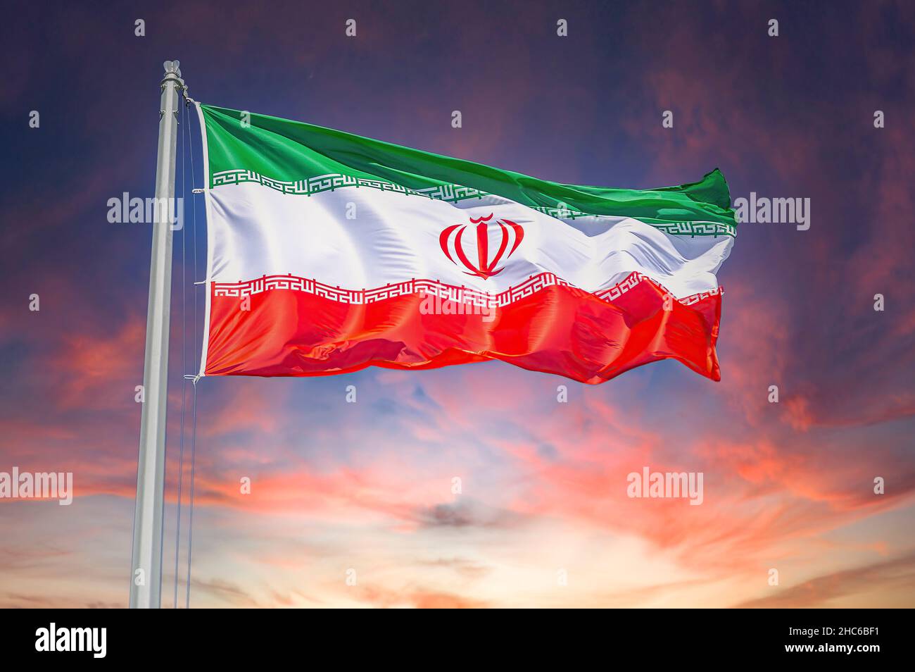 Iranian state flag waving on the wind against the background of a ...