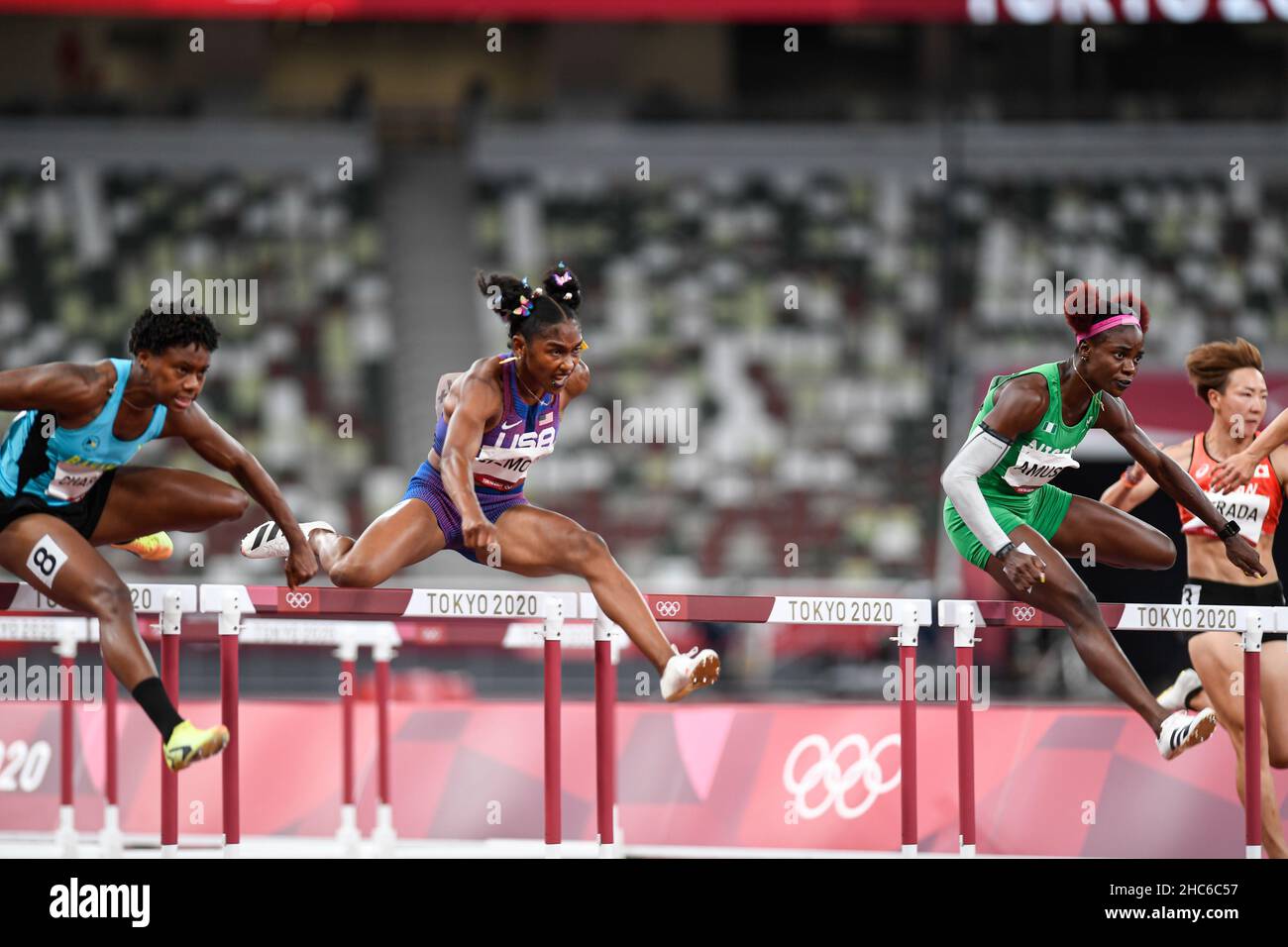 Christina Clemons running in the final of the 100 meter hurdles at the ...
