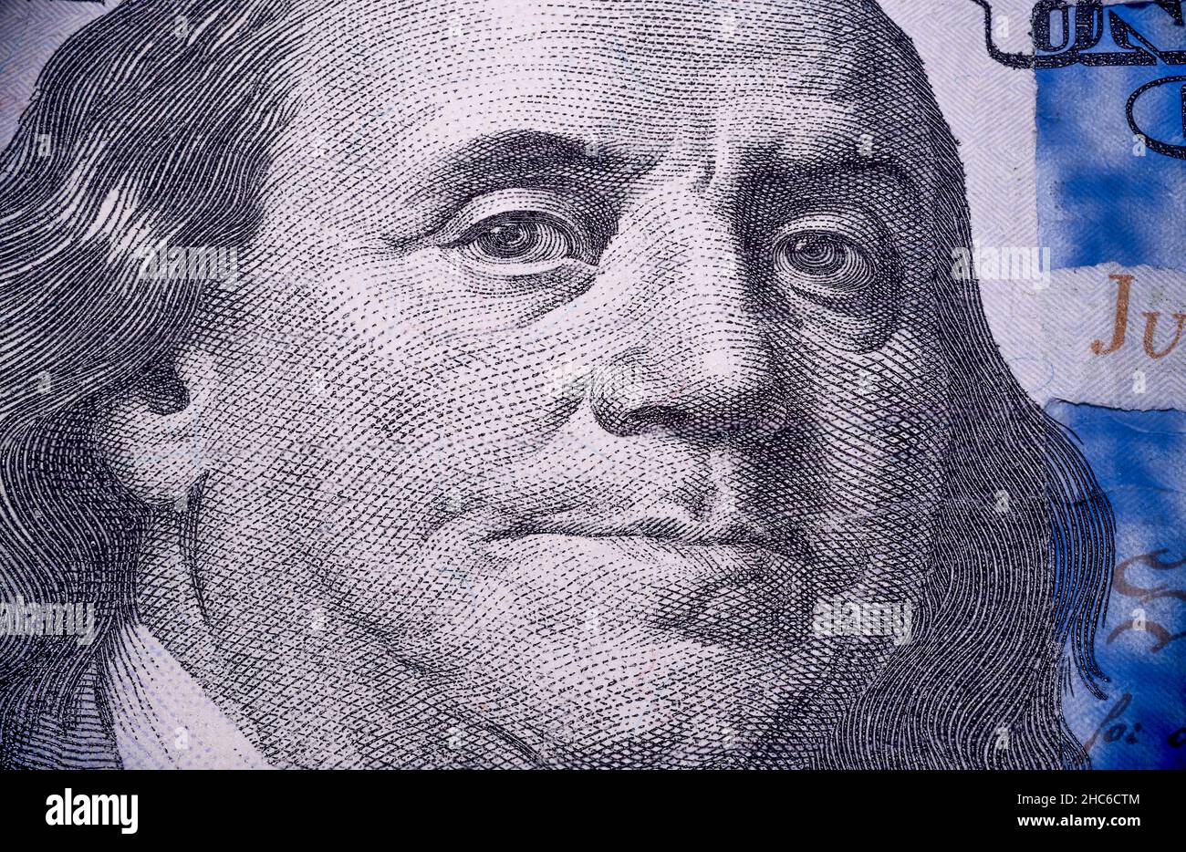 Shot of the US One Hundred dollar bill with focus on Benjamin Franklin ...