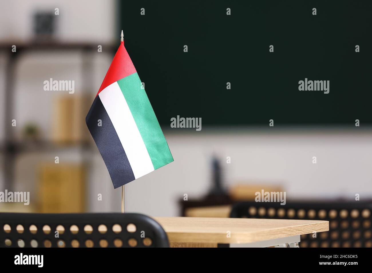 UAE flag on desk in classroom Stock Photo - Alamy
