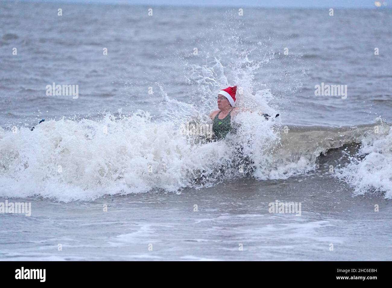 Swimmers take a Christmas Day dip at Portobello Beach in Edinburgh ...