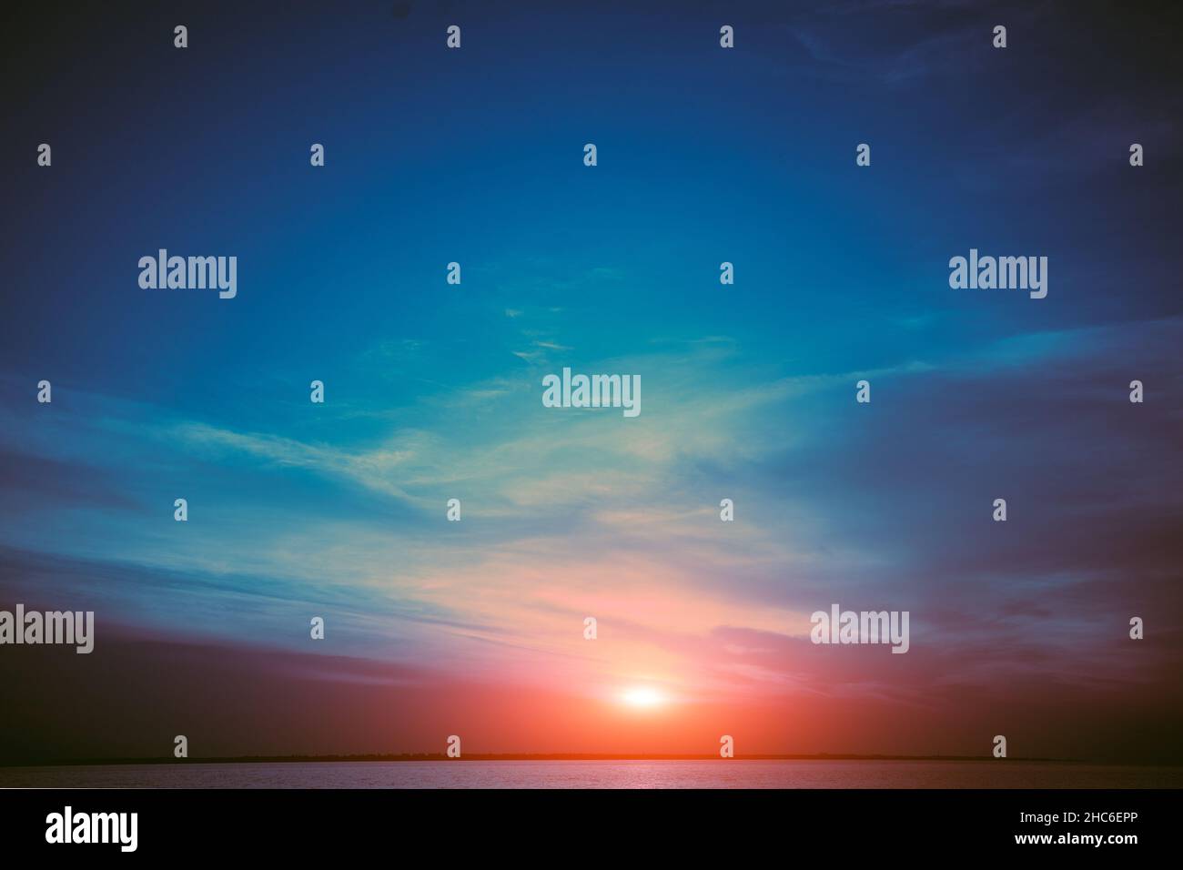 Colorful cloudy sky over the sea at sunset. Sky texture, abstract ...