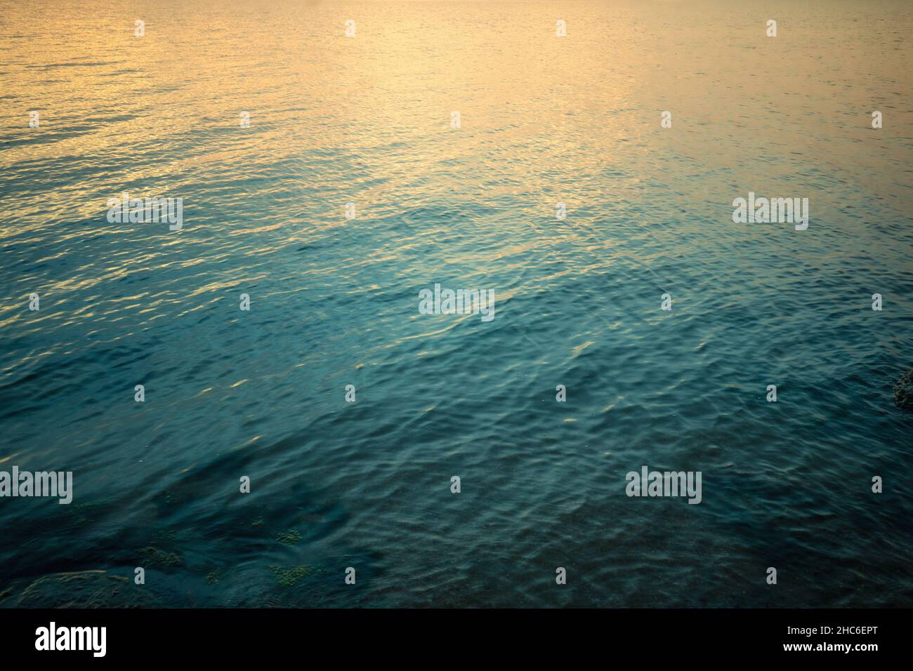 Top view of seawater at sunset. Abstract nature landscape background ...