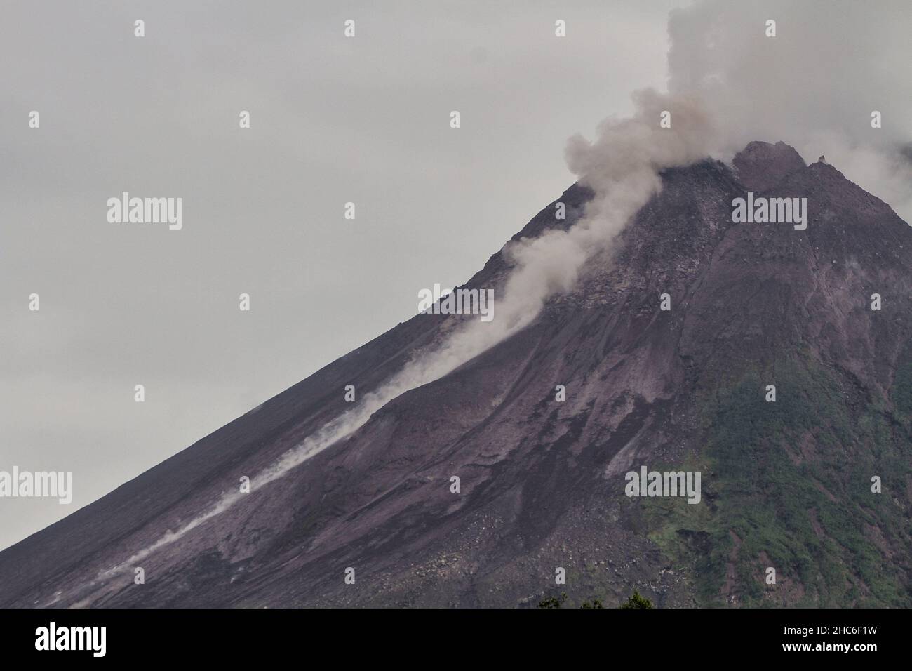 Mount Merapi, Indonesias most active volcano spews ash and smoke from ...