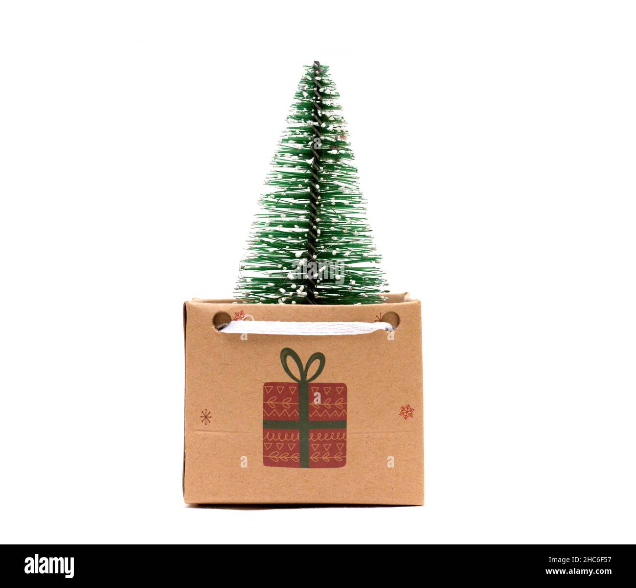 Christmas package with a New Year tree. Feast of the Nativity of Christ ...