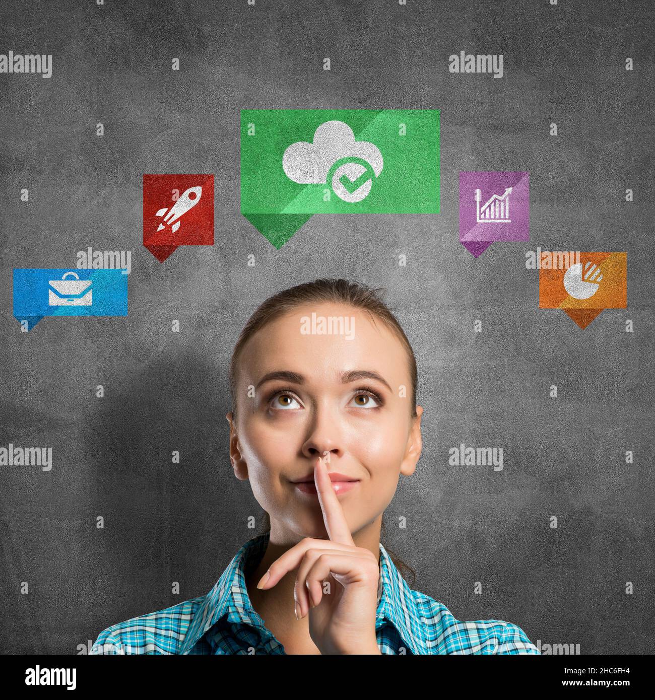 Girl showing hush gesture Stock Photo - Alamy