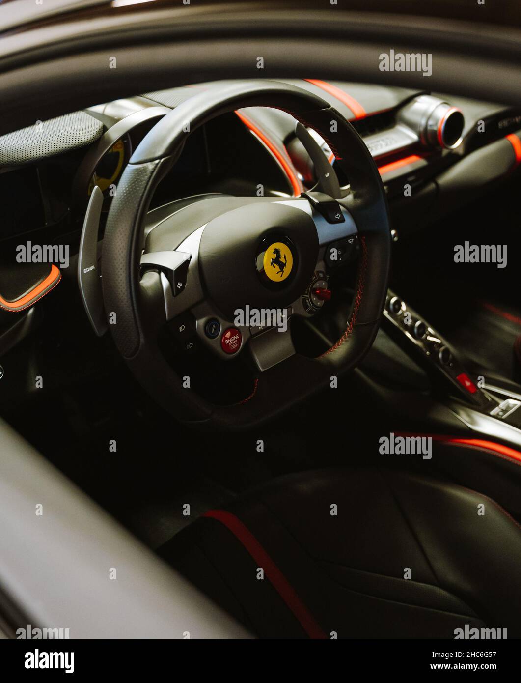 Steering wheel of an expensive supercar in the showroom of a car ...