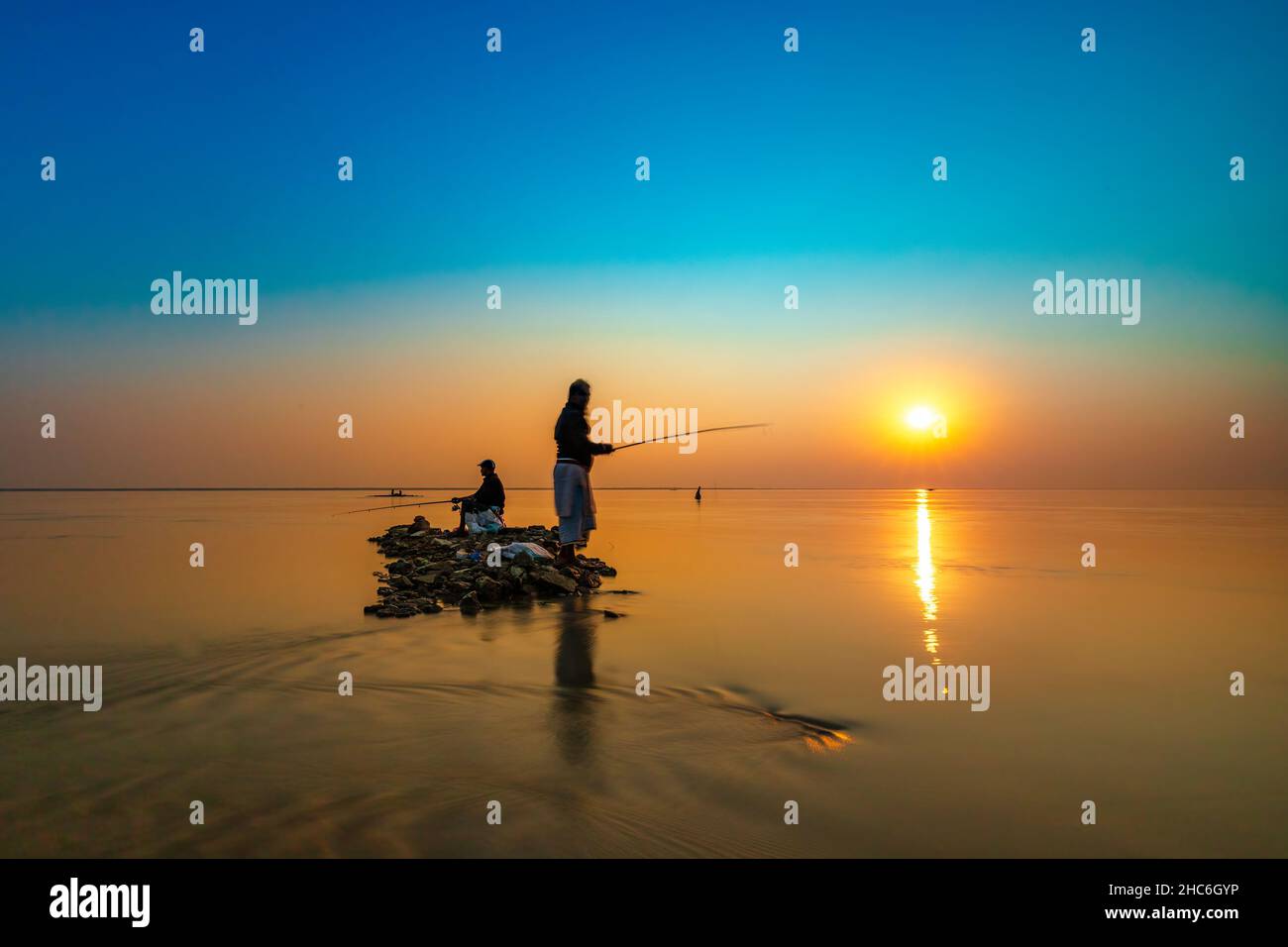 Beautiful sunset over the tropical sea Stock Photo - Alamy