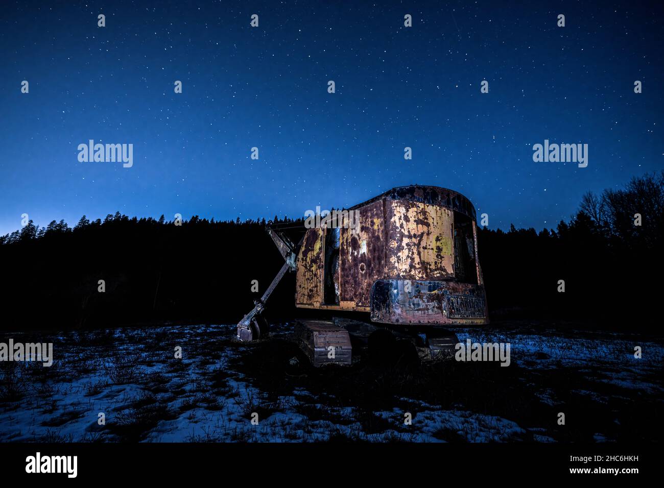Old Excavator in a Field at Night Stock Photo - Alamy