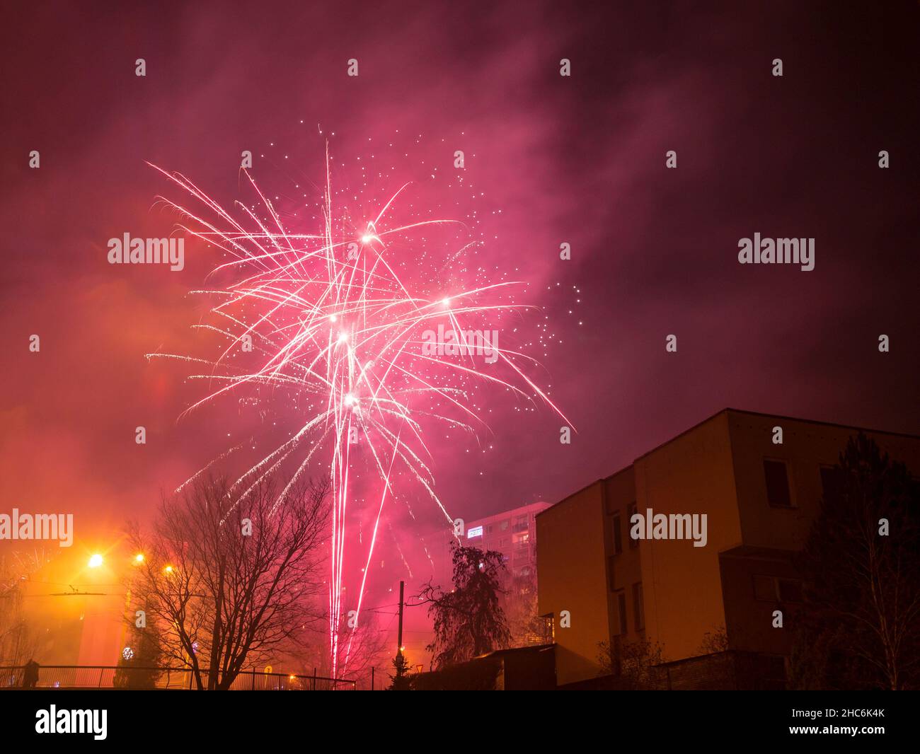 New Year's fireworks create smoke over houses on the outskirts of the ...