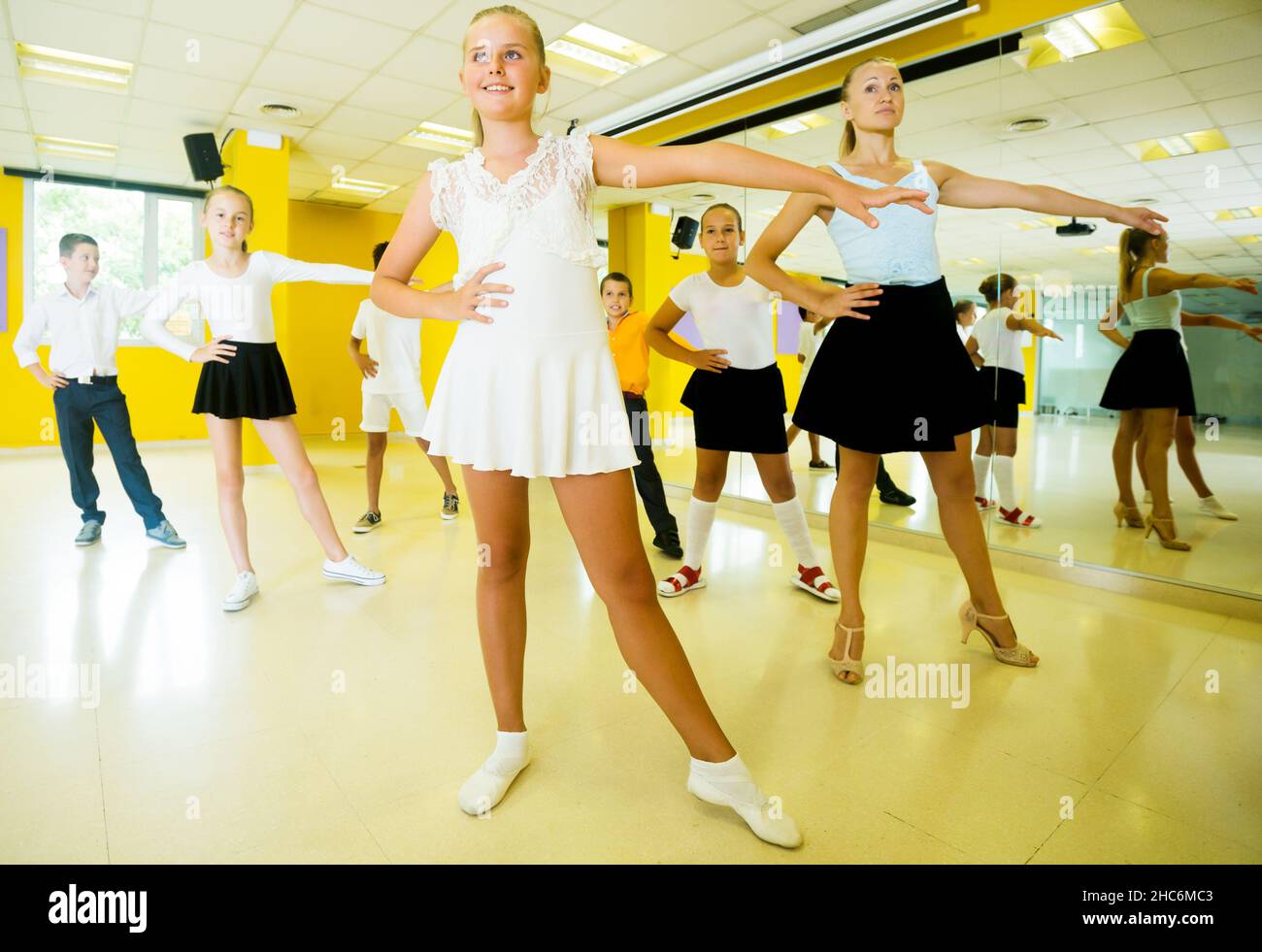 Children learn dance movements in dance class Stock Photo - Alamy